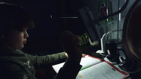 4K Child Doing Homework on Multiple Devi... | Stock Video | Pond5
