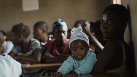 4K Children & young adults from a poor A... | Stock Video | Pond5