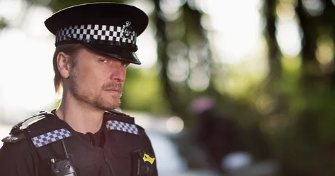 Police Officer Smiling Stock Footage ~ Royalty Free Stock Videos | Pond5