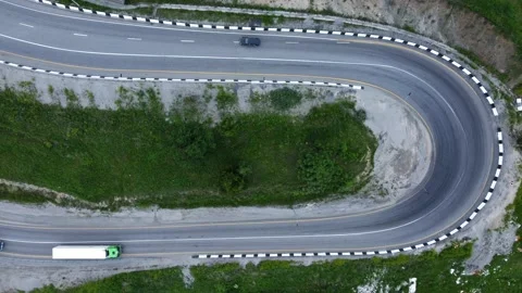 4k Close top view of vehicles drive down... | Stock Video | Pond5