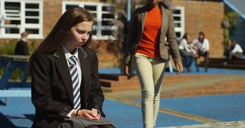 4k, A concerned teacher talking to a you... | Stock Video | Pond5