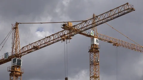 4K Crane machine work on construction si... | Stock Video | Pond5