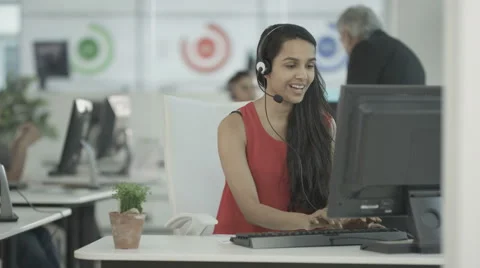 4K Customer service ops taking calls in ... | Stock Video | Pond5