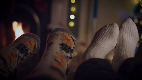 4k Dancing Feet In Woollen Socks By The ... | Stock Video | Pond5