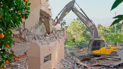4k, Demolition machine is breaking the f... | Stock Video | Pond5