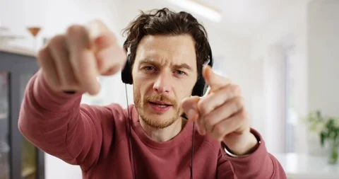 4K DJ looking into camera, playing music... | Stock Video | Pond5