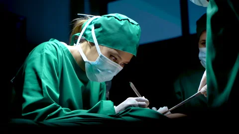 4K, Doctor performs urgent surgery for a... | Stock Video | Pond5