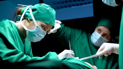4K, Doctor performs urgent surgery for a... | Stock Video | Pond5