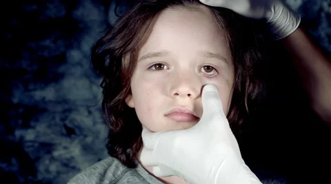 4k Dramatic Shot of a Sick Child Being E... | Stock Video | Pond5
