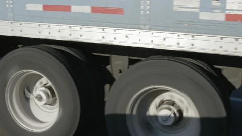 4K driving plate side view of a commerci... | Stock Video | Pond5