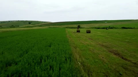 4k Drone flyover footage of farmed field... | Stock Video | Pond5