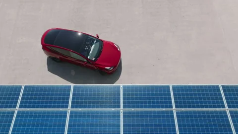 4K electric, zero pollution car on green... | Stock Video | Pond5