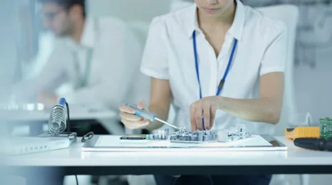 4K Electronics engineer working in lab b... | Stock Video | Pond5