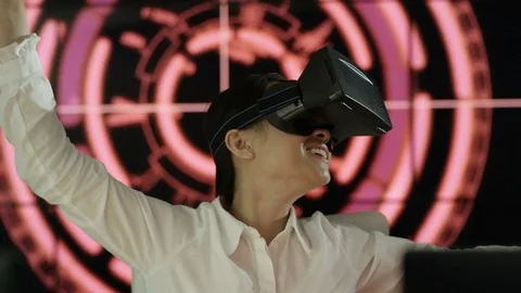 4K Engineer wearing VR viewer at desk wi... | Stock Video | Pond5