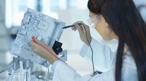 4K Engineer working in electronics facto... | Stock Video | Pond5