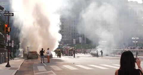 4K EXTREME LONG SHOT OF CARS BURNING DUR... | Stock Video | Pond5