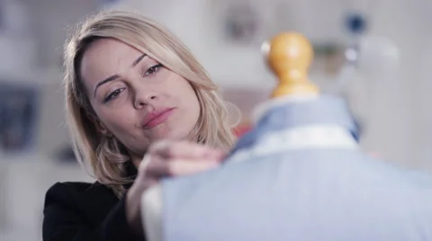 4K Fashion designer in her studio, looki... | Stock Video | Pond5