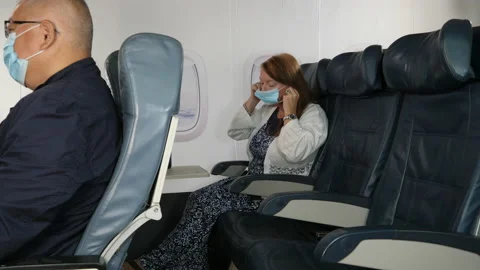 Airplane Mask Stock Videos – Royalty-Free HD & 4K Videos | Pond5