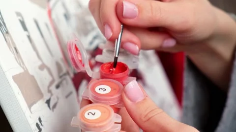 4k Female hand Mixing paint for drawing ... | Stock Video | Pond5