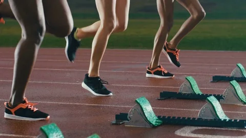 4K Female runners at athletics track cro... | Stock Video | Pond5
