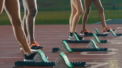 4K Female runners at athletics track cro... | Stock Video | Pond5