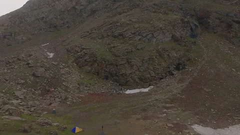 4K Fly Forward DRONE SHOT of Trekker's t... | Stock Video | Pond5