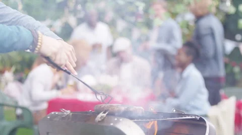 4K Food being cooked on a bbq while frie... | Stock Video | Pond5