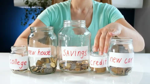 4k footage of young woman pouring money ... | Stock Video | Pond5