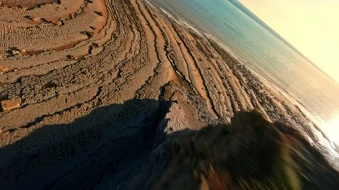 4K FPV Aerial view of monk nash beach kn... | Stock Video | Pond5