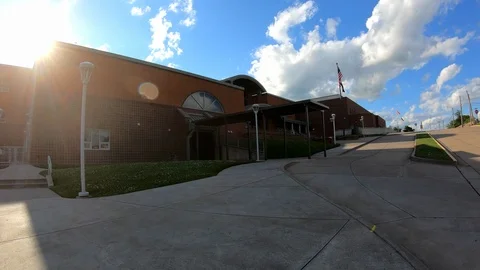 4k front of high school building with su... | Stock Video | Pond5