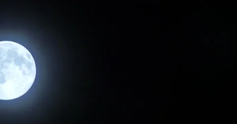 4K. Full moon moving across night sky ba... | Stock Video | Pond5