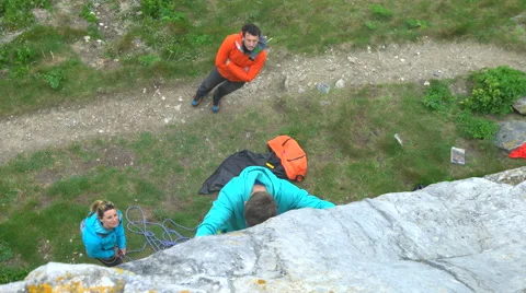 4K Group of climbers beginning a climb o... | Stock Video | Pond5