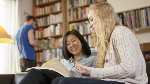 4K Group of students relaxing & reading ... | Stock Video | Pond5