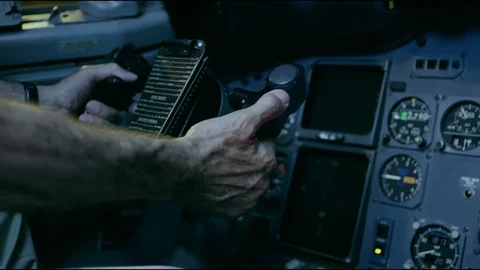 4k Hand of pilot turns the steering whee... | Stock Video | Pond5