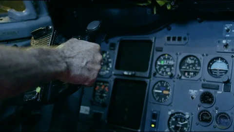 4k Hand of pilot turns the steering whee... | Stock Video | Pond5