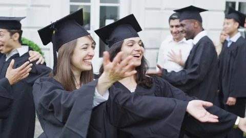 4K Happy students on graduation day hugg... | Stock Video | Pond5