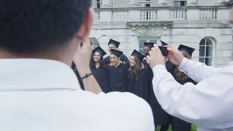 4K Happy students on graduation day posi... | Stock Video | Pond5