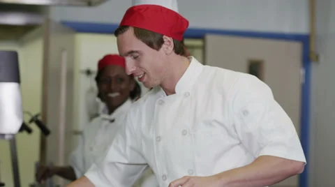 4K Happy team of chefs chatting as they ... | Stock Video | Pond5