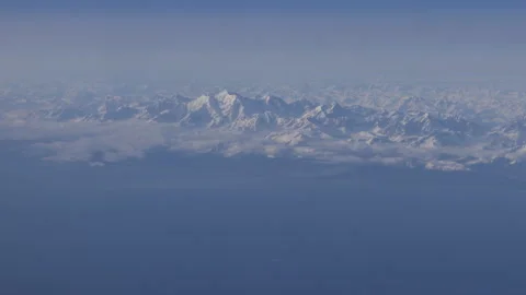 4K high altitude aerial of a snowy and s... | Stock Video | Pond5