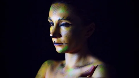 4K Horror Serpent Makeup Woman, zoom out | Stock Video | Pond5