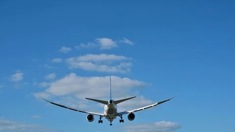 4K Huge airplane rear view landing on ru... | Stock Video | Pond5