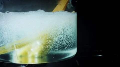 4k Italian Pasta Spaghetti Boiling in Gl... | Stock Video | Pond5