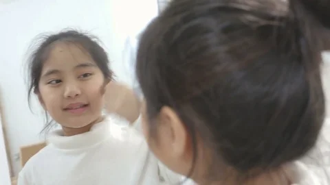 4K : Little Asian child blushing her fac... | Stock Video | Pond5