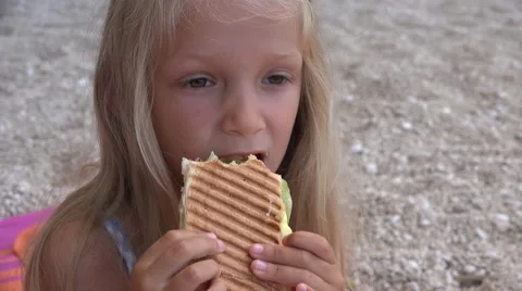 Girl Eating Sandwich Stock Video Footage | Royalty Free Girl Eating ...