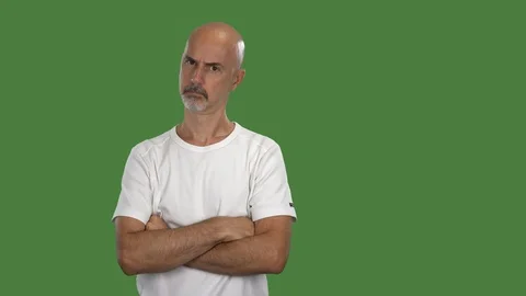 4K loop man on green screen looking ser... | Stock Video | Pond5