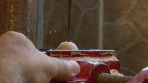 4k A man maneuvers a pillar drill to dr... | Stock Video | Pond5