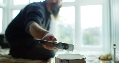 4K Man painting interior window trim, wi... | Stock Video | Pond5