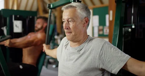 4K Mature man working out with weights i... | Stock Video | Pond5