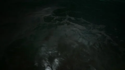 4K motion scene of water surface on dark... | Stock Video | Pond5