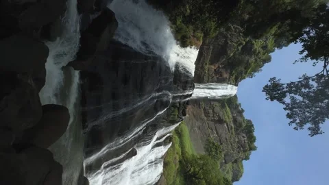 4K Nature Slow motion A waterfall with a... | Stock Video | Pond5